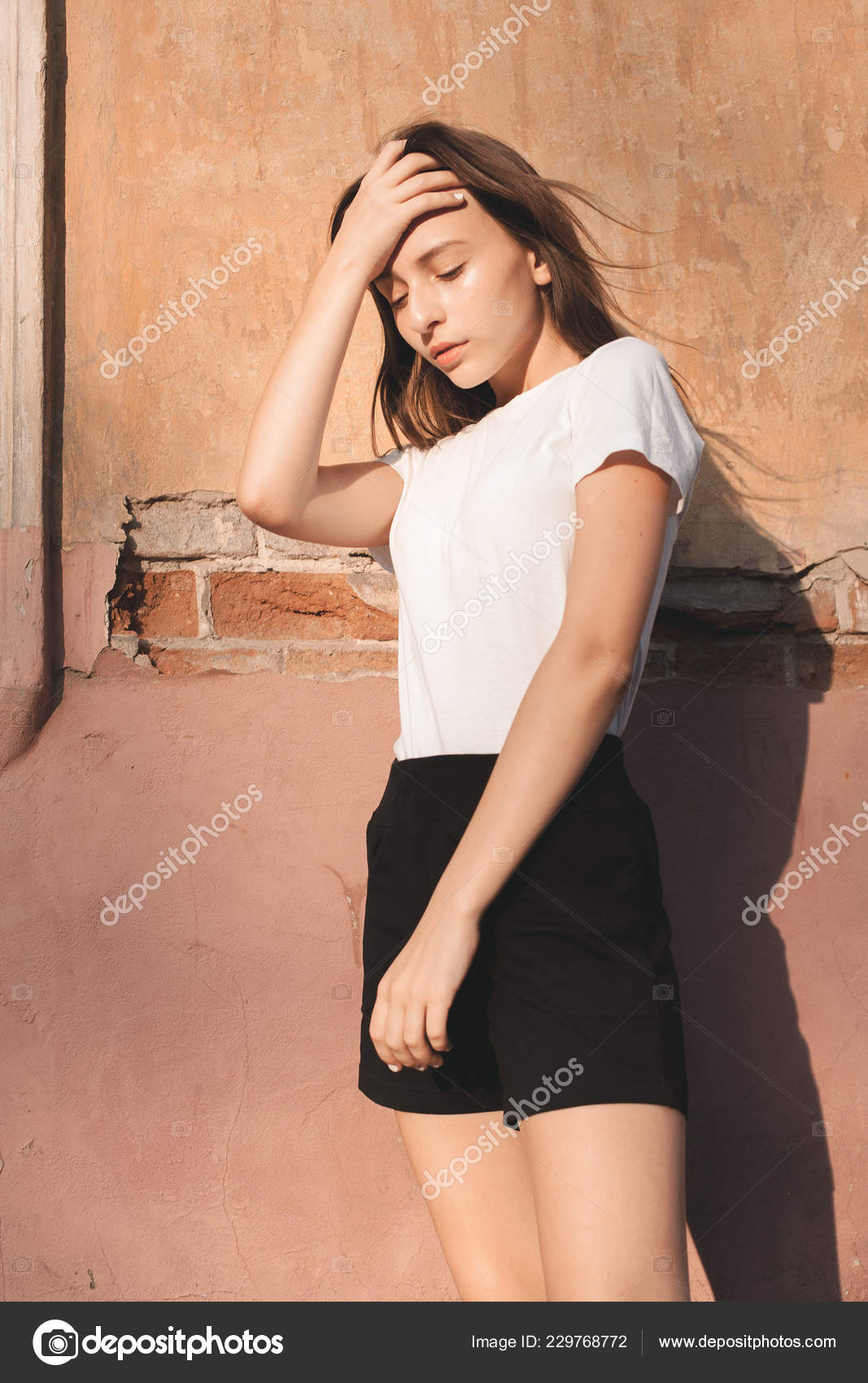 Beautiful Model Posing Wall City Stock Photo by ©Dima_Aslanian 229768772