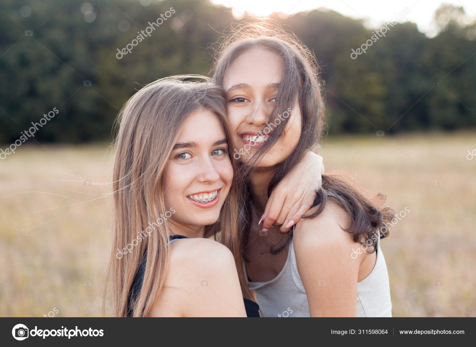 Two Beautiful Young Women Hugging Outdoors Sunset Best Friends — Stock ...