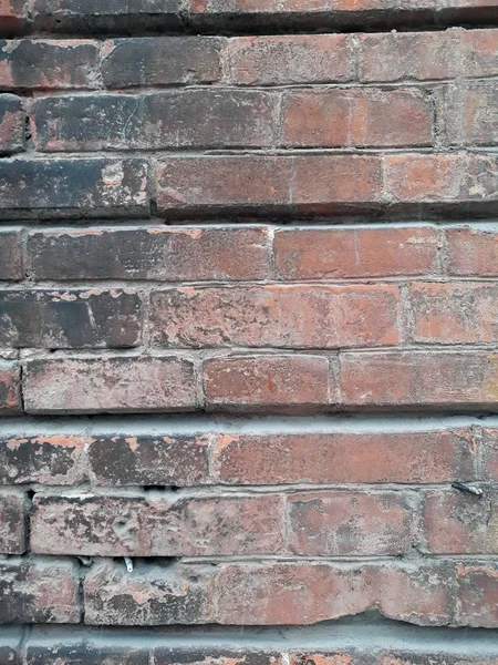 Texture of the old brick wall. The bricks of one of Yekaterinoslav ...