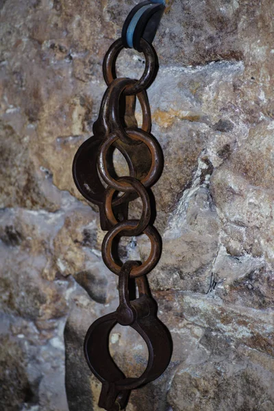 Slave Chained To Wall