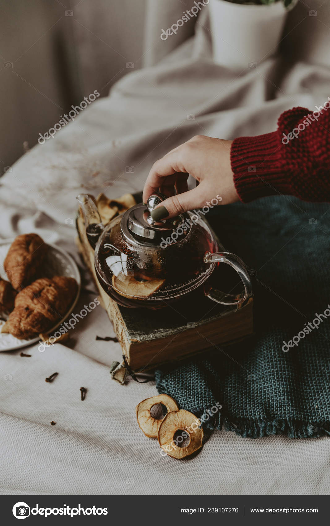 Pouring hot black tea from restaurant style cattle. Selective focused ...