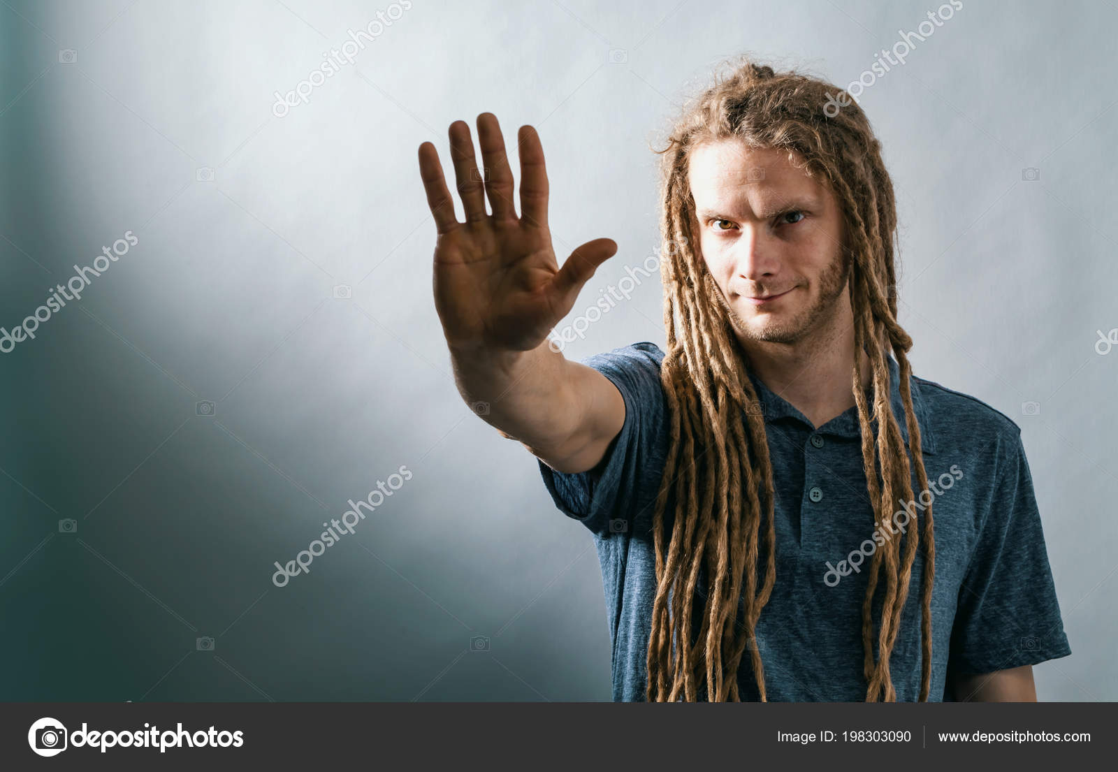 Young man making a rejection pose Stock Photo by ©Melpomene 198303090