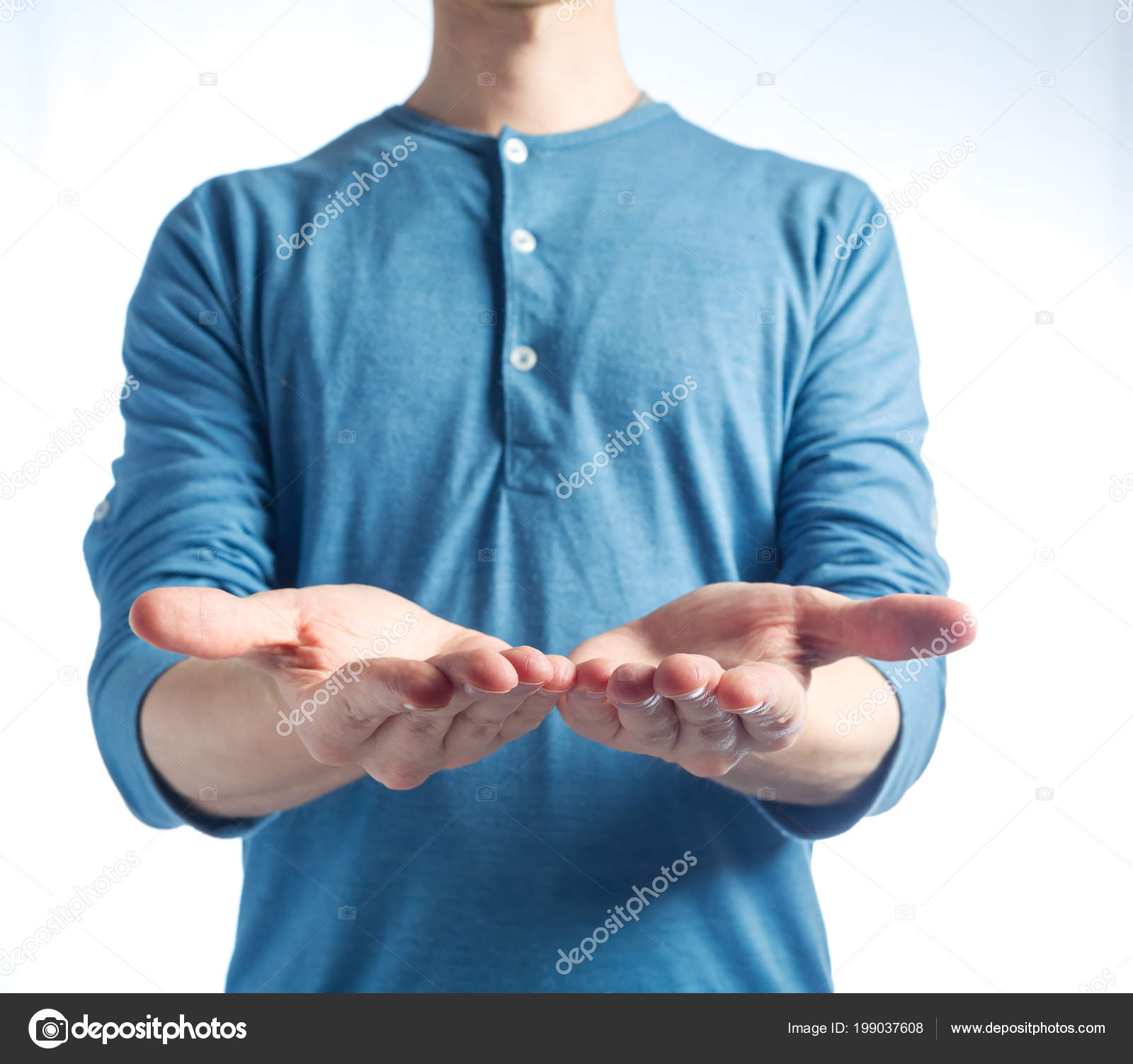 Man holding his hands out and showing something Stock Photo by ...