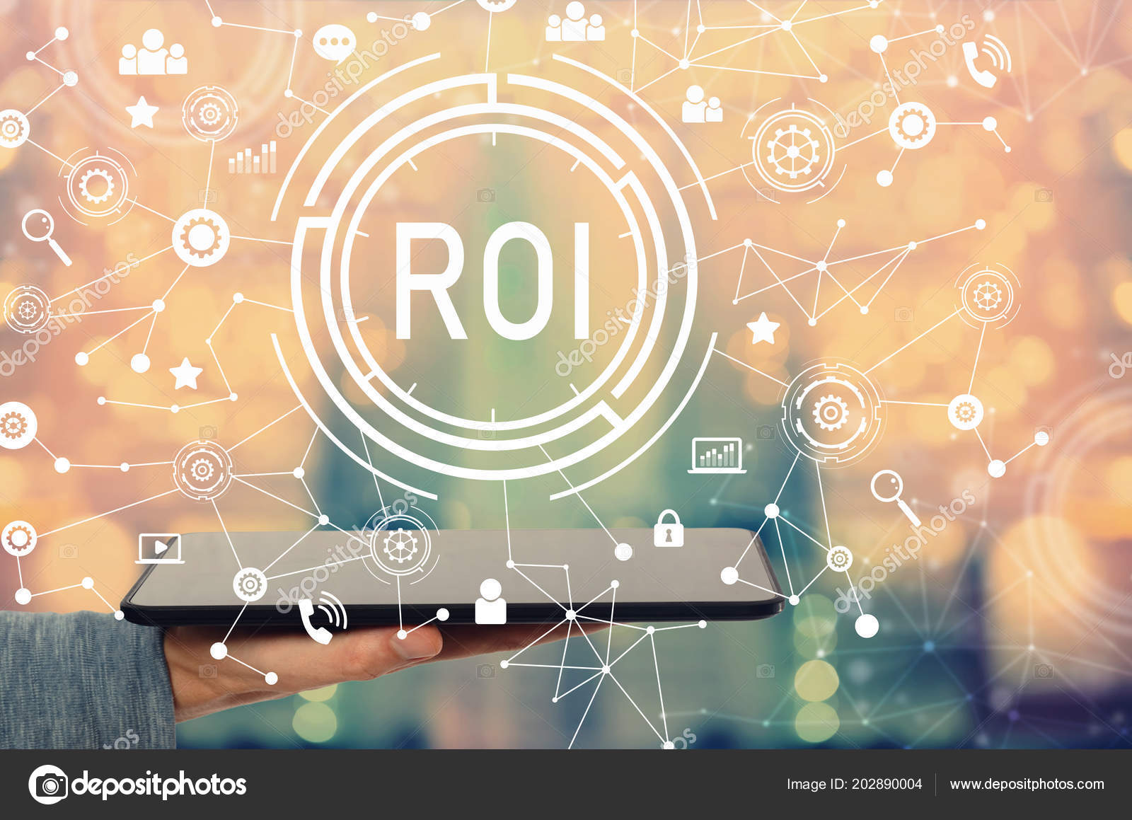 ROI with man holding a tablet Stock Photo by ©Melpomene 202890004