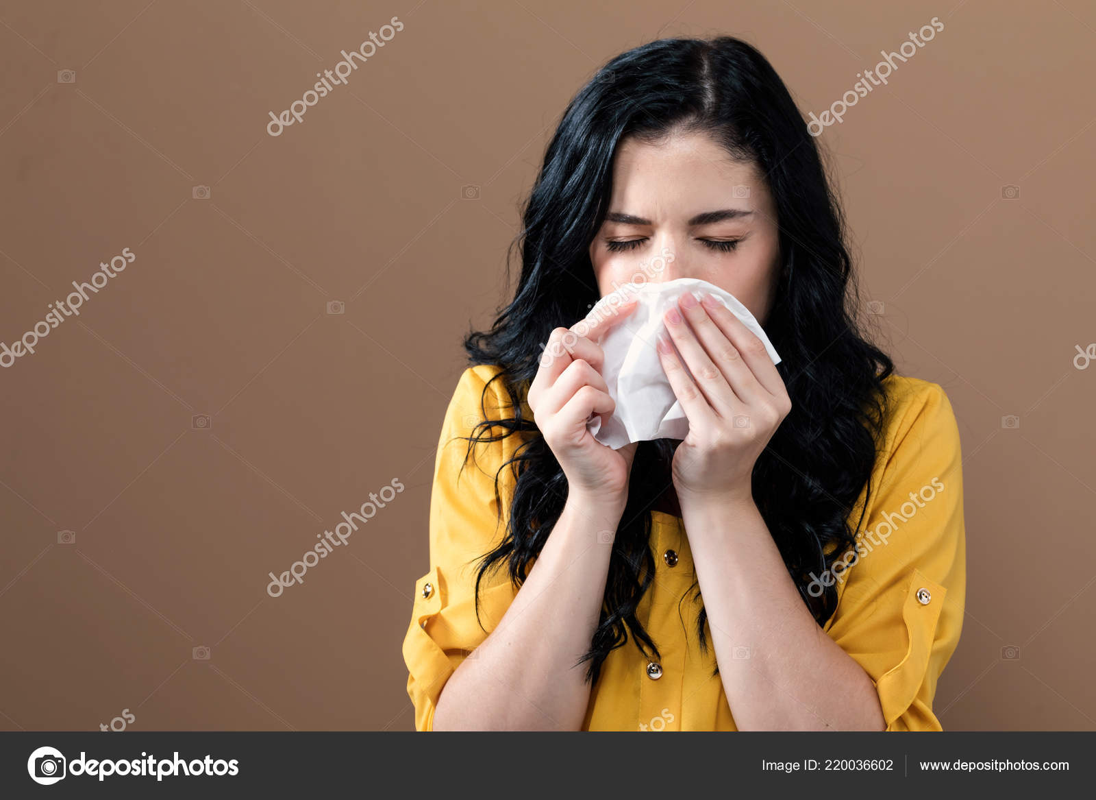 Sick young woman with tissues Stock Photo by ©Melpomene 220036602