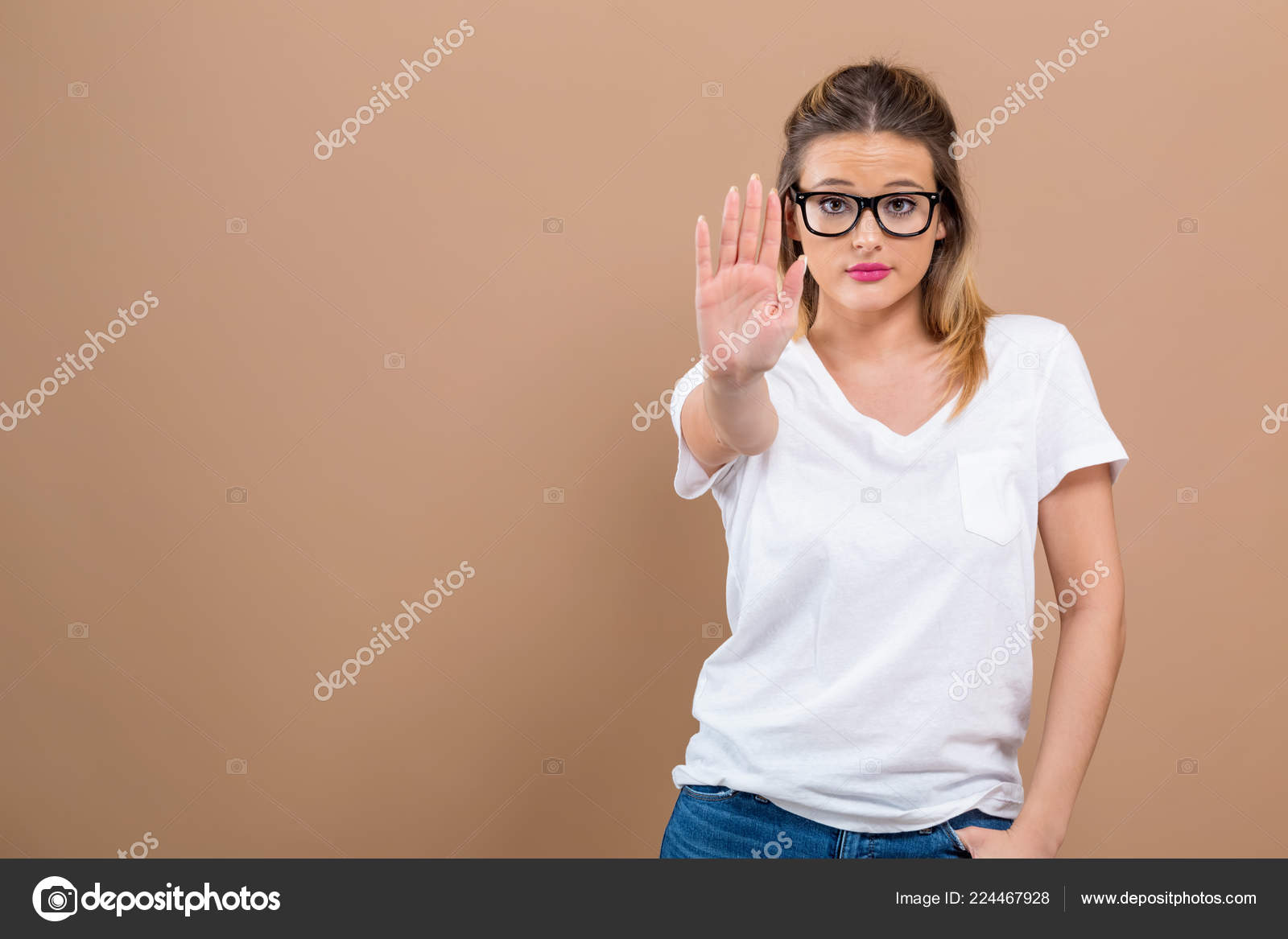 Young woman making a rejection pose — Stock Photo © Melpomene #224467928