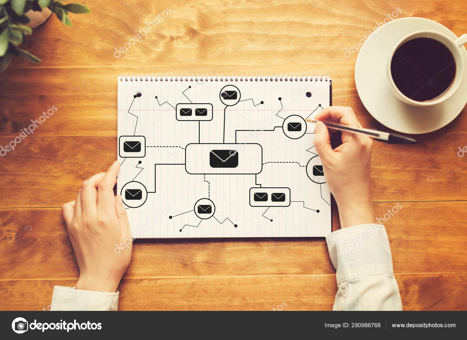 Emails with a person writing in a notebook Stock Photo by ©Melpomene ...