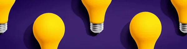 Yellow light bulb pattern with shadow - Stock Image - Everypixel