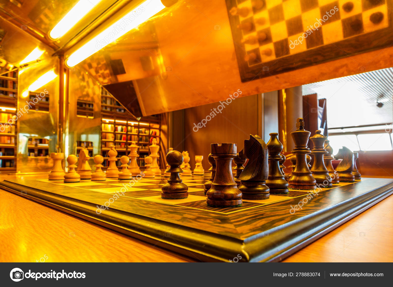 Chess set in a cruise ship library Stock Photo by ©khellon 278883074
