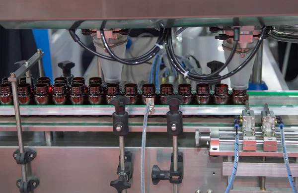 Bottle capping machine Stock Photos, Royalty Free Bottle capping ...