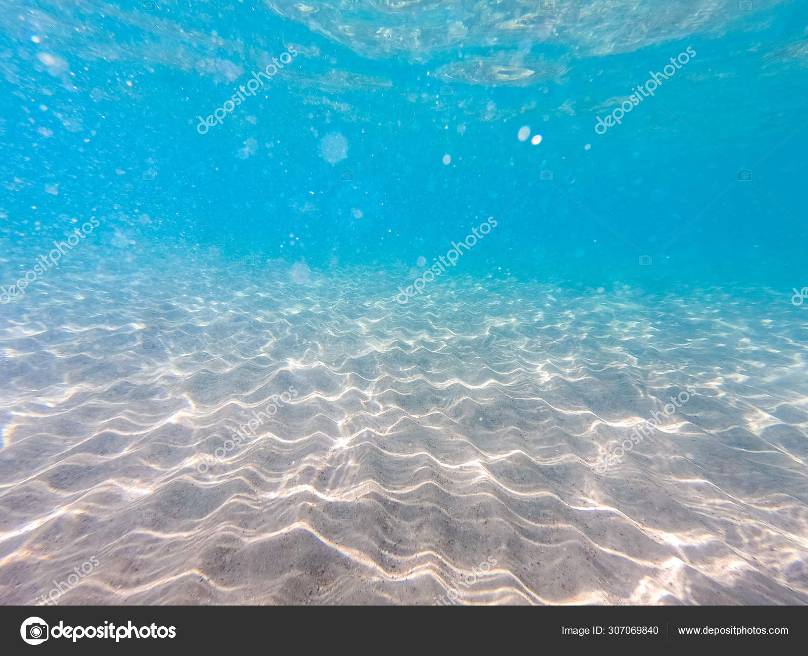 Underwater Texture Ocean Underwater Wave In Sea. Water Texture In