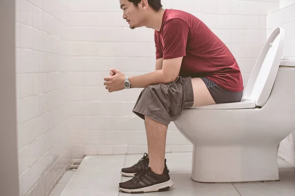 Man pooping Stock Photos, Royalty Free Man pooping Images | Depositphotos
