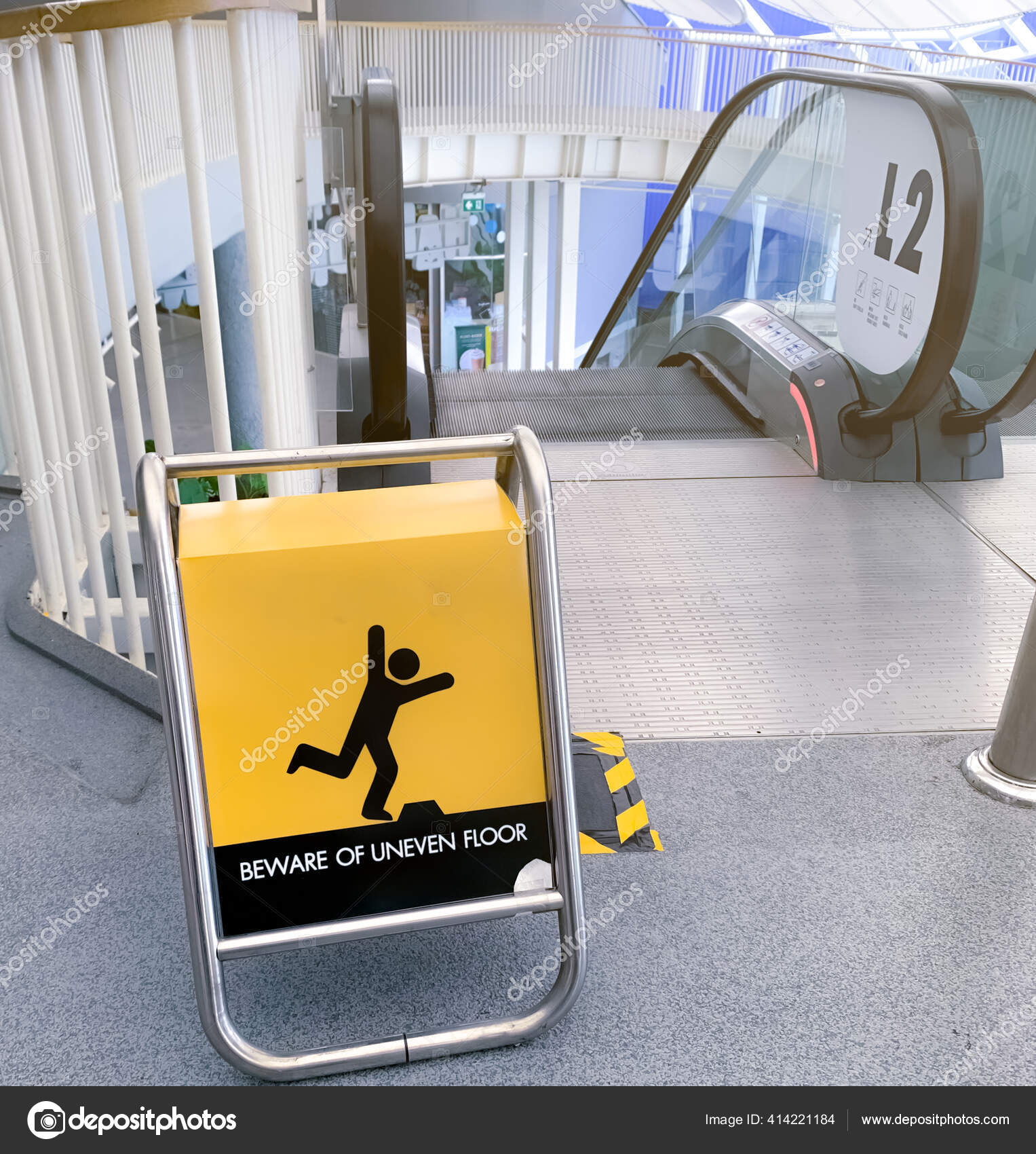 Beware Uneven Floor Warning Sign Yellow Board Front Escalator Shopping ...