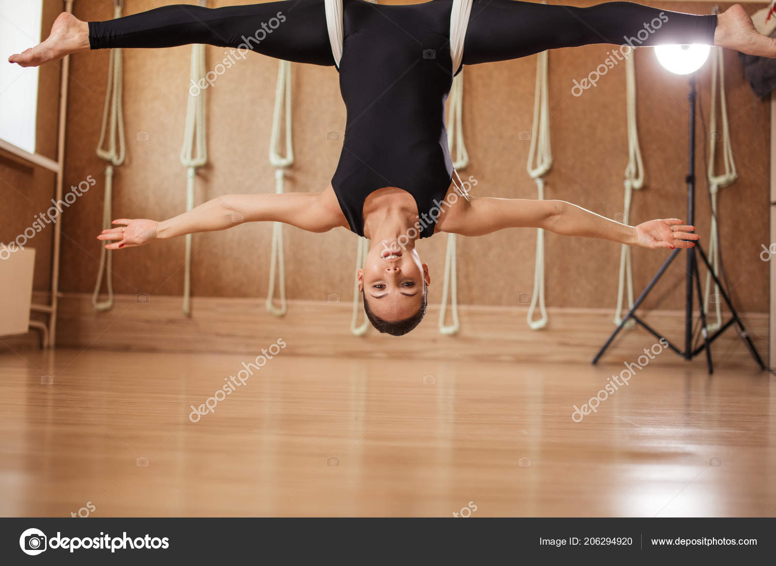 Hanging upside down pose with stretching twine Stock Photo by ...