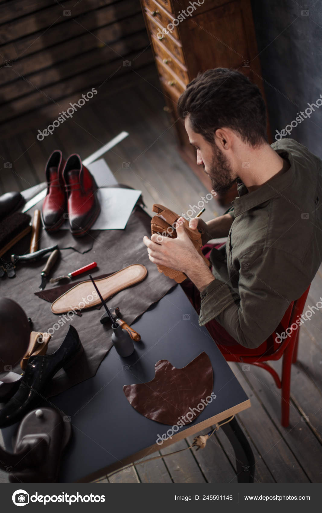 Shoemaker is choosing the fabric for shoes Stock Photo by ©ufabizphoto ...
