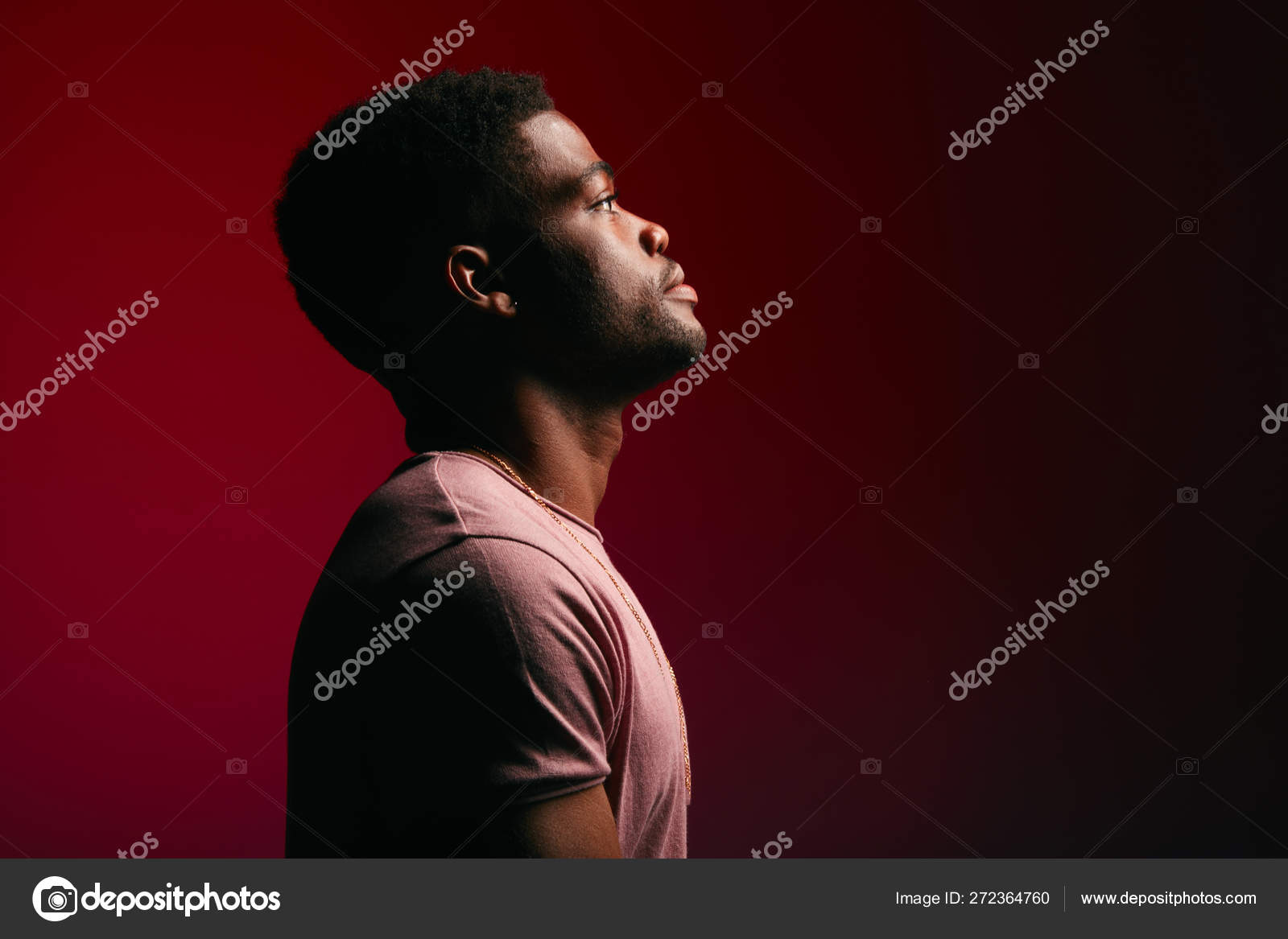 Side view of african handsome young man with neutral calm face ...