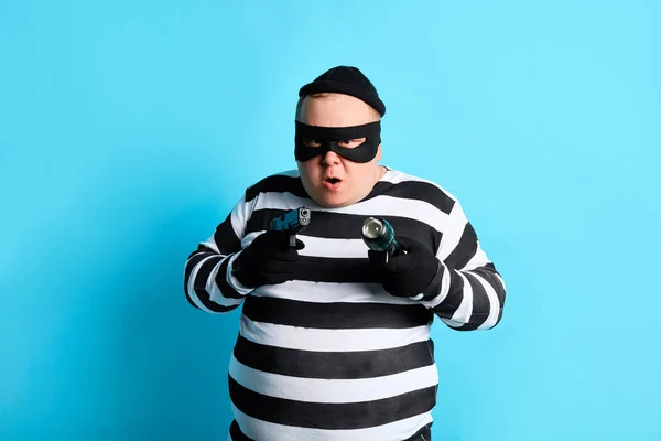 Fat prisoner with pipe wrench in his hand Stock Photo by ©ufabizphoto ...