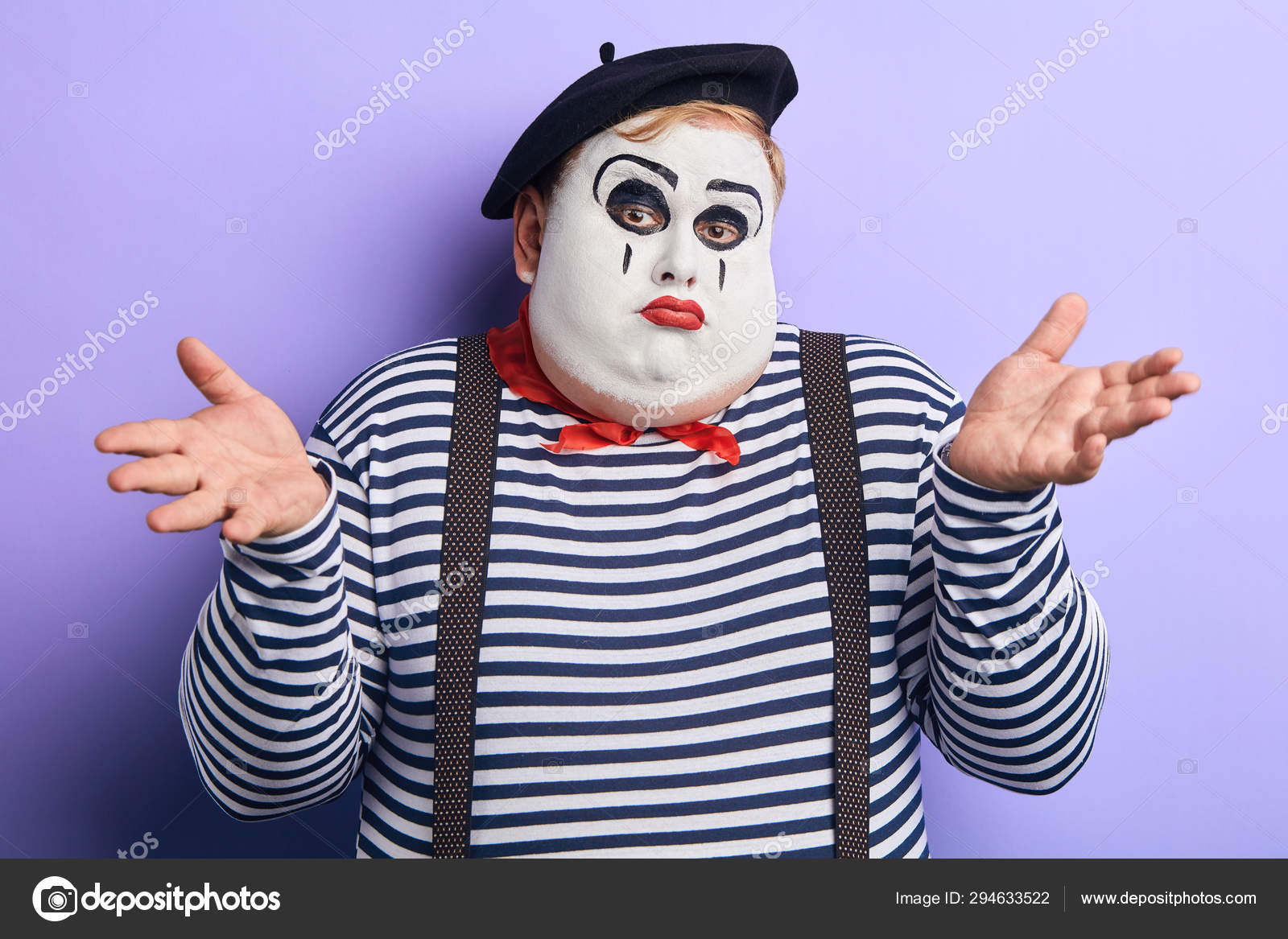 I dont know. puzzled man with raised arm expresses his disinterest ...