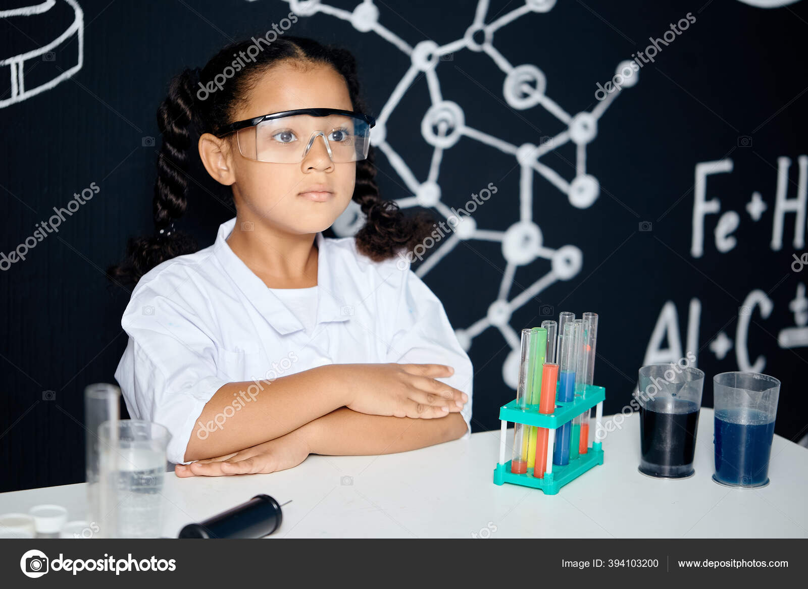 Little scientist. Children scientists making experiments in the ...