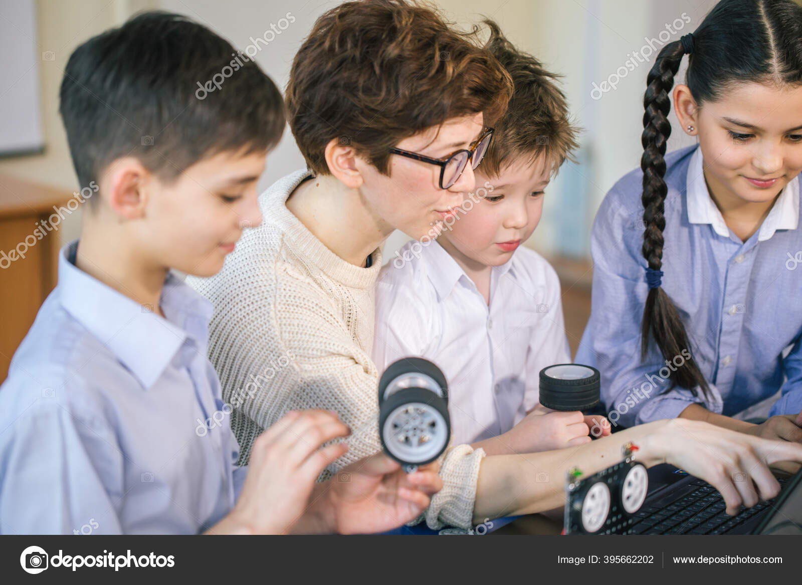 Happy children learn programming using laptops on extracurricular ... Happy children learn programming using laptops on extracurricular ...