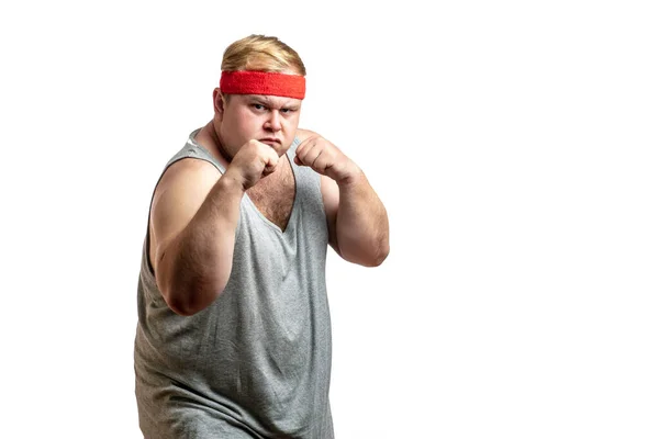 Fat man, feeling furious, in fight stance ready to hit, white isolated ...