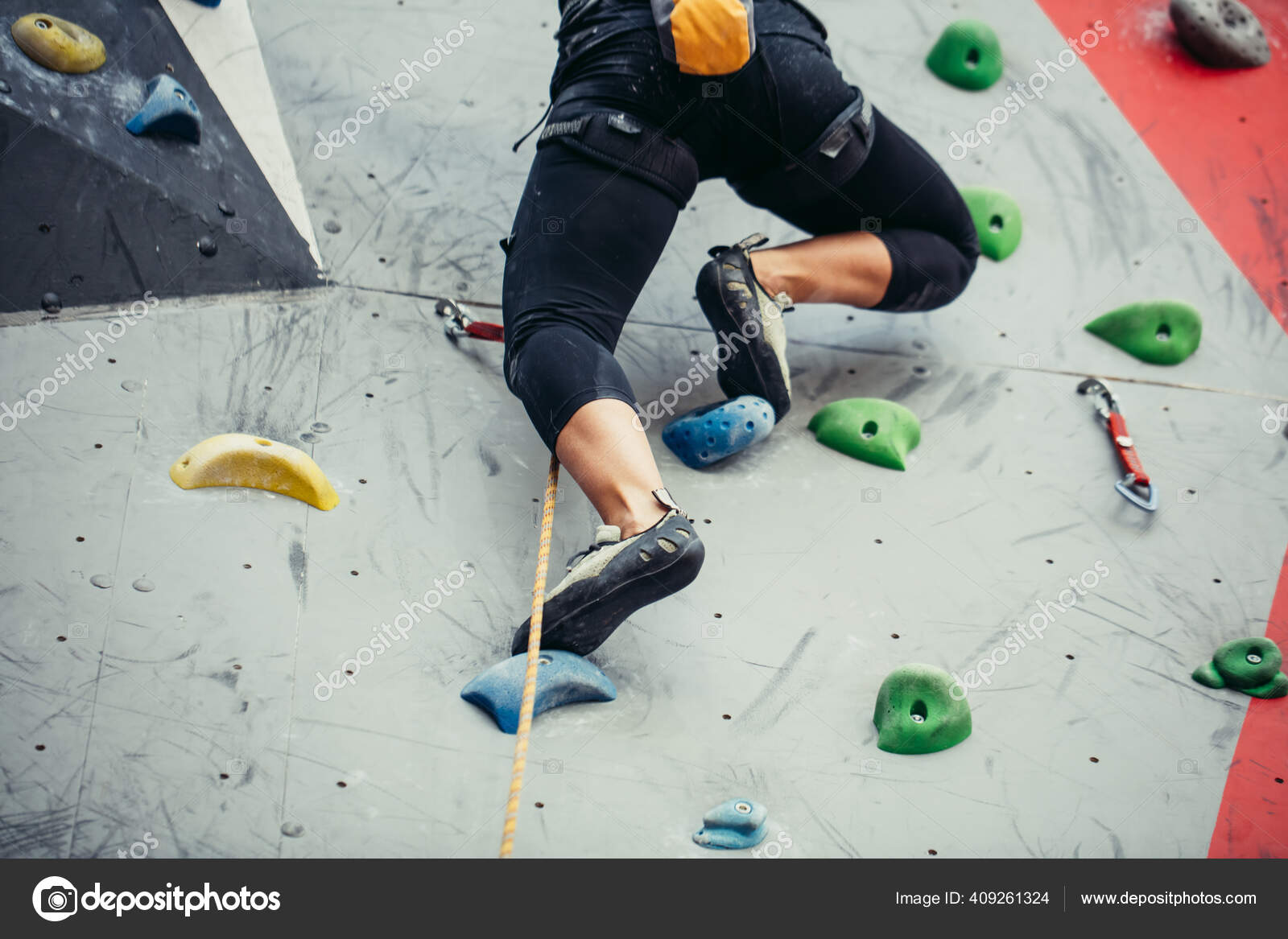 Rock climber legs in climbing shoes close up Stock Photo by ...