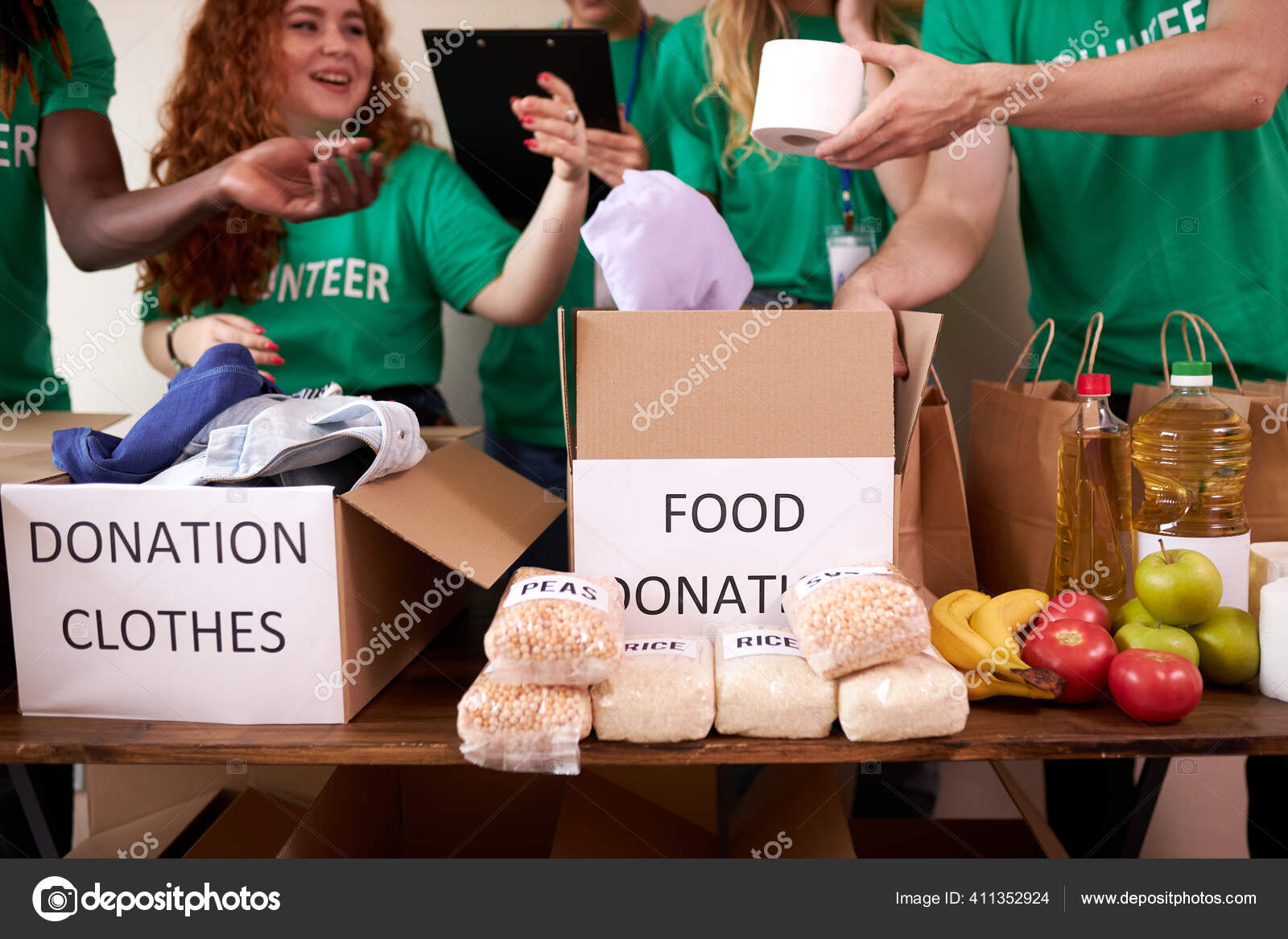 Group of diverse people working in charitable foundation Stock Photo by ...