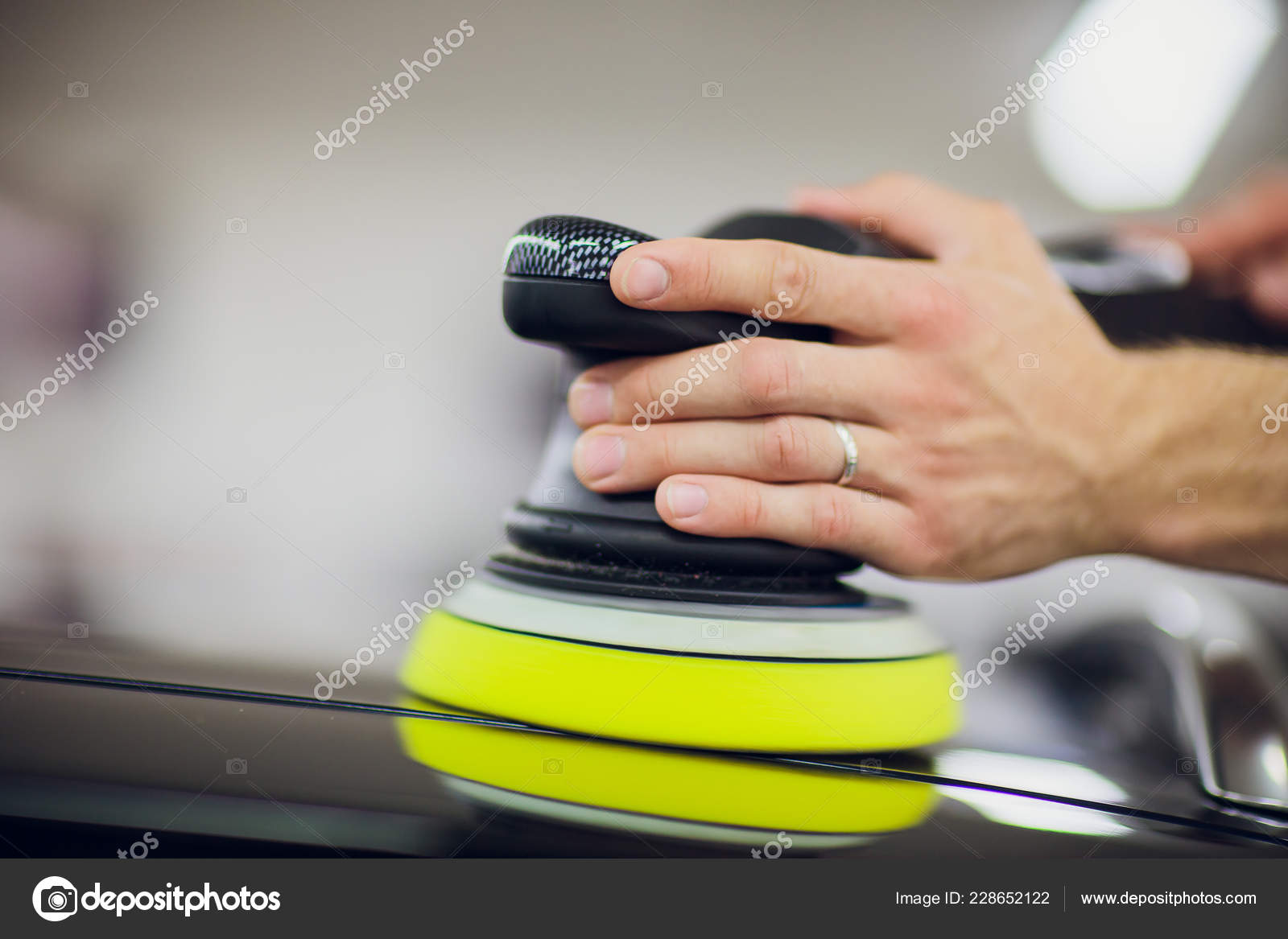 Polished black car polishing machine polished finishing. Car detailing ...