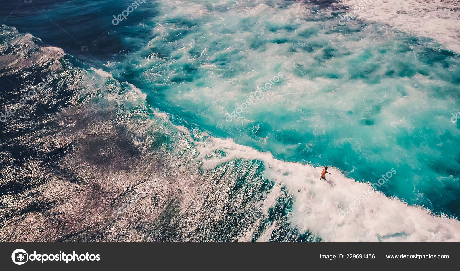 Aerial view surfers and wave in tropical ocean. Top view Stock Photo by ...