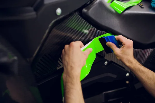 Car ATV wrapping specialists wrapping vehicle with green vinyl film or ...