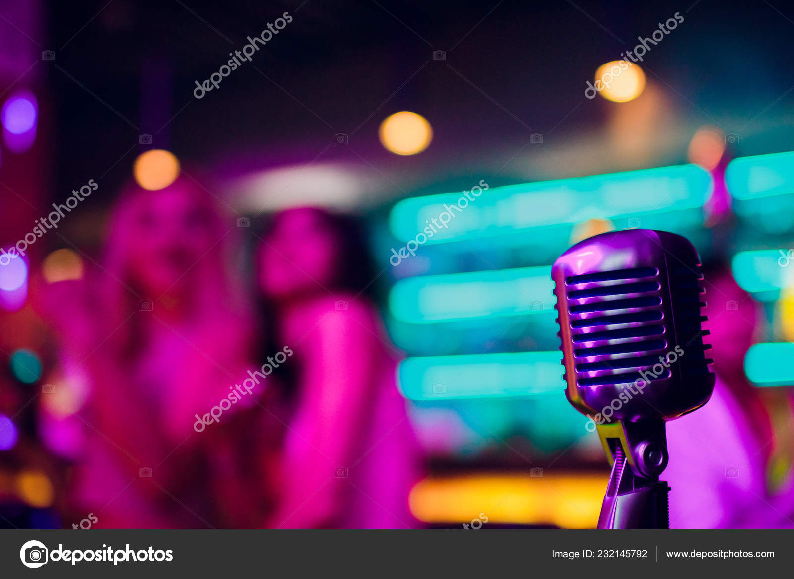Microphone on stand up comedy stage with reflectors ray, high contrast ...