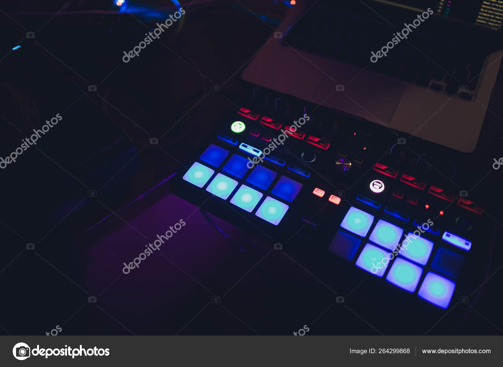 Digital midi controller panel with colorful disco light, Dj turn table ...