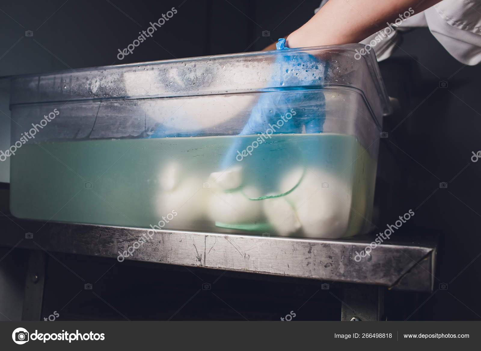Production process of mozzarella cheese, cheese making process. Stock ...