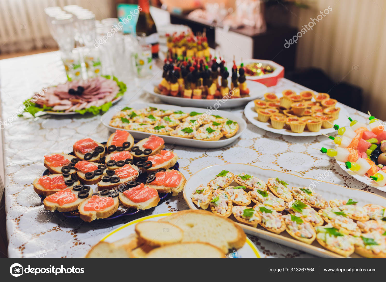 Different types of canapes on buffet table. Stock Photo by ©vershinin ...