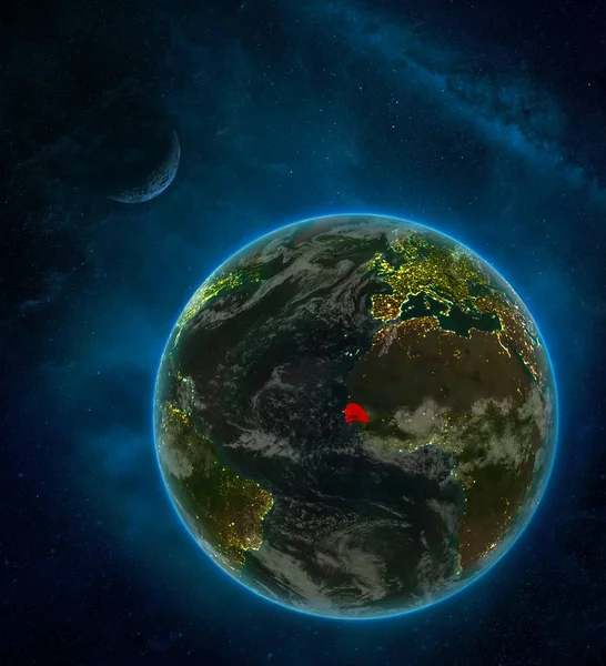 Senegal from space on Earth at night surrounded by space with Moon and ...