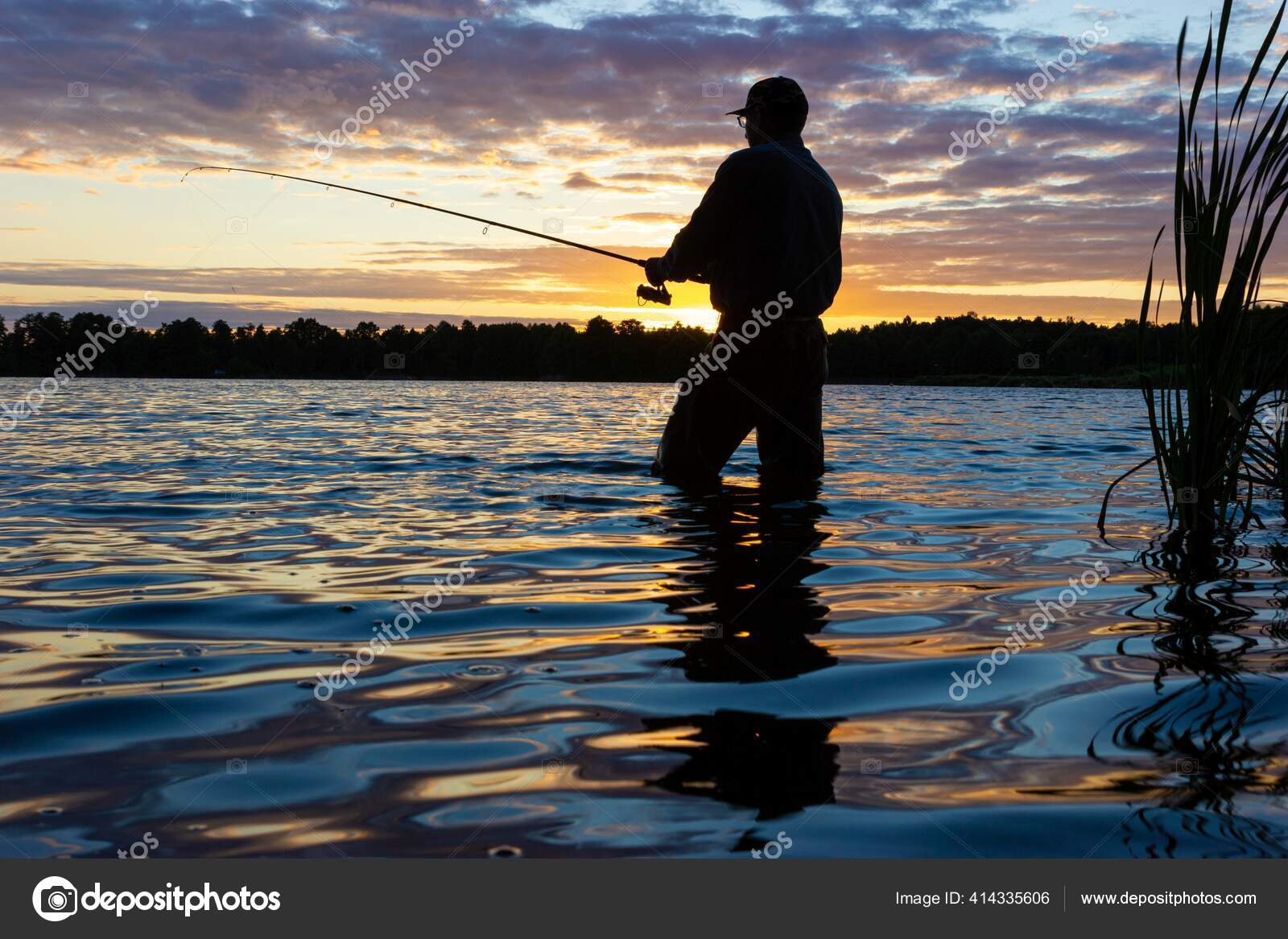 Silhouette Angler Catching Fish Durring Sunset — Stock Photo © mtmmarek ...