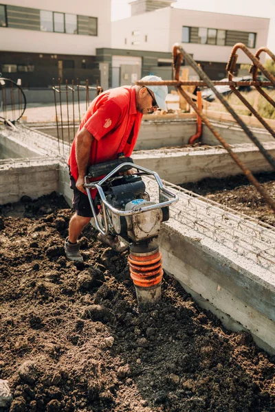 Details Construction Worker Using Compactor Earth Soil Compacting Stock ...