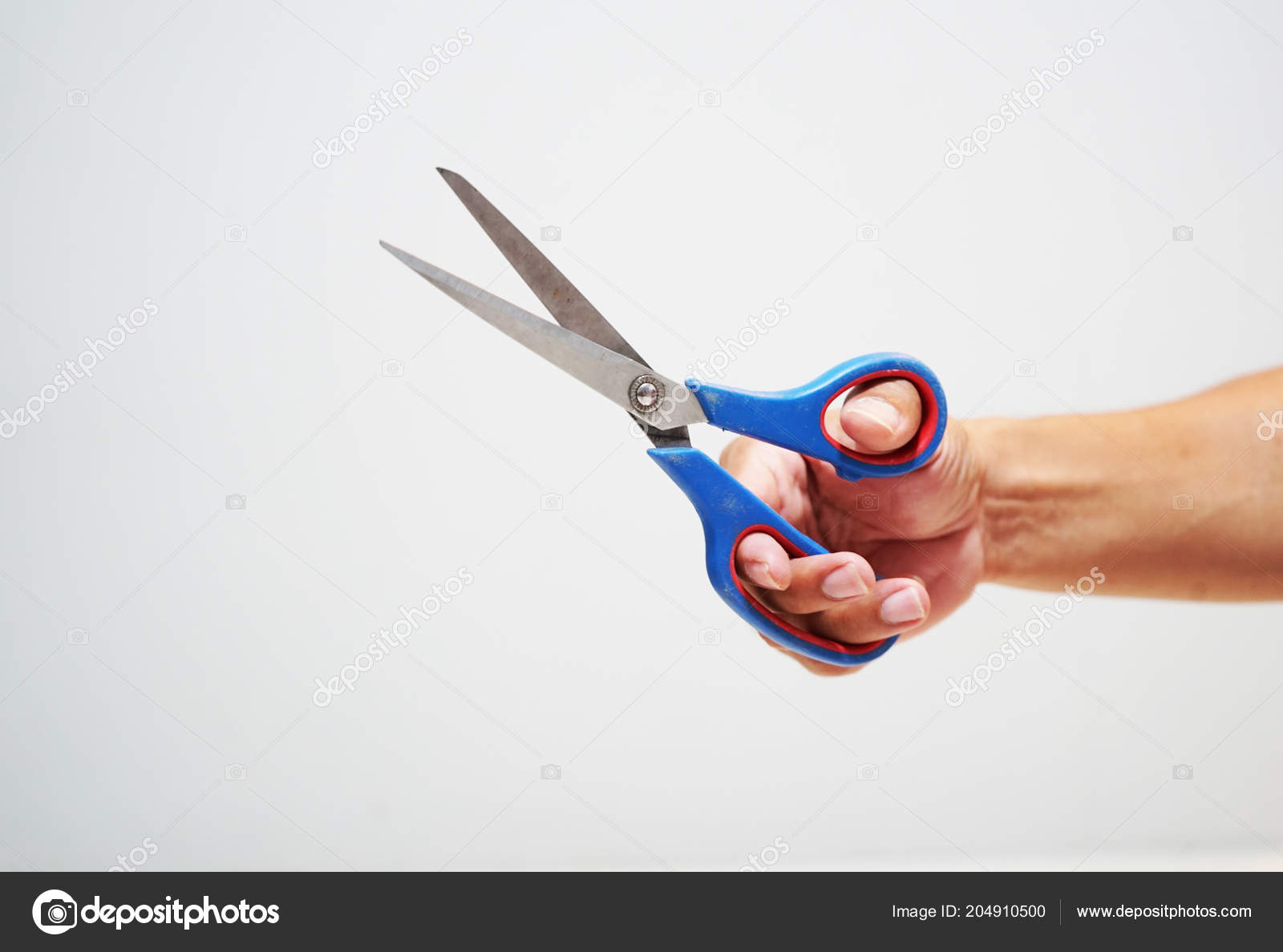 Close Hand Holding Blue Red Scissors White Background Stock Photo by ...