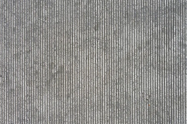Texture of gray concrete wall with vertical cutouts. Texture of old ...