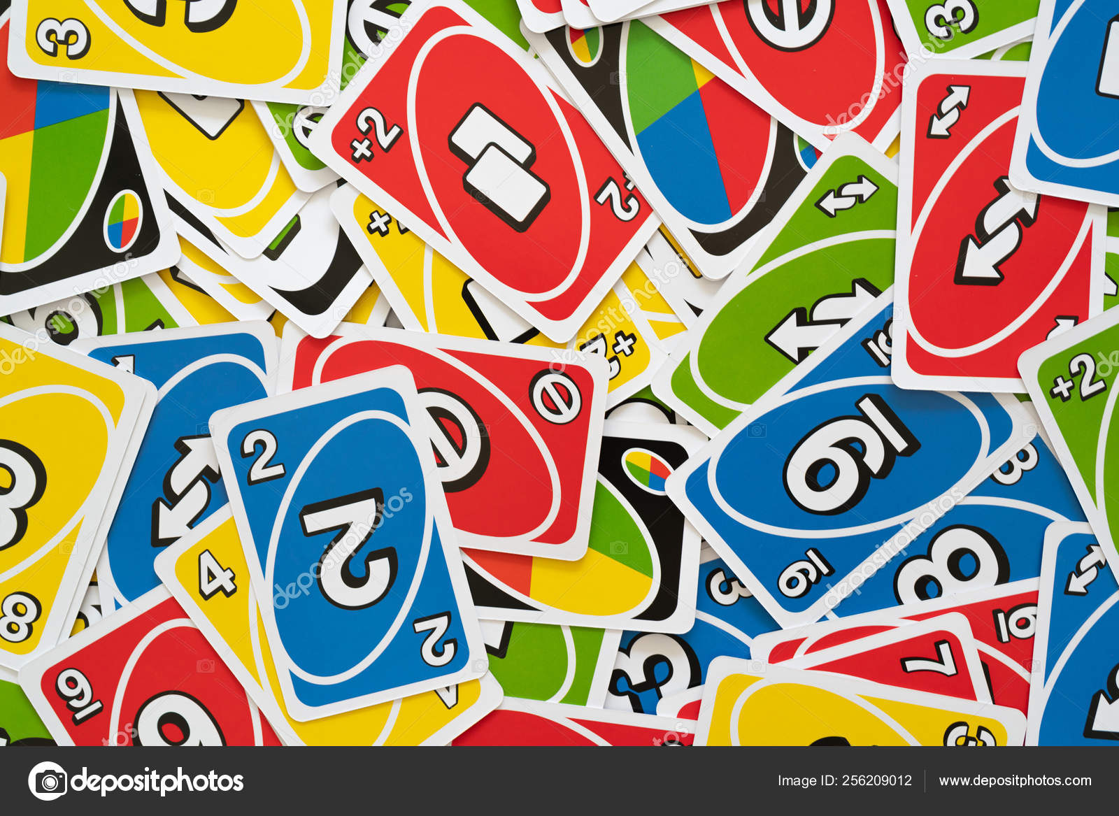 Uno game cards scattered all over the frame background Stock ...
