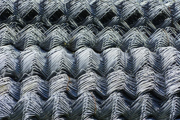 Rolls of galvanized steel wire mesh with a large cell and twisted ...