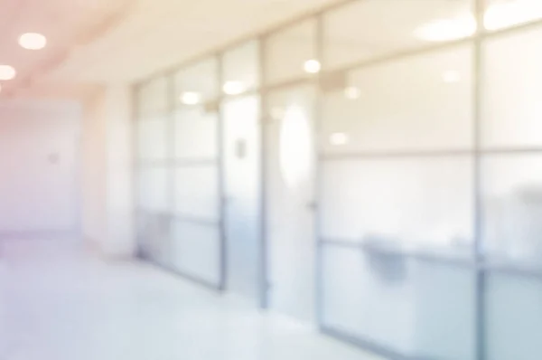 Blurred office background , office worker on the computer — Stock Photo ...