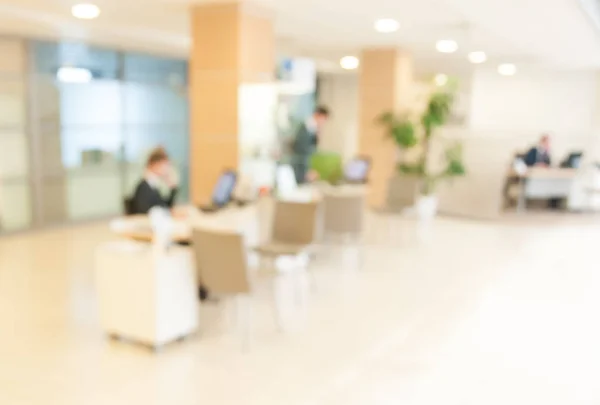 Blurred office background , office worker on the computer — Stock Photo ...