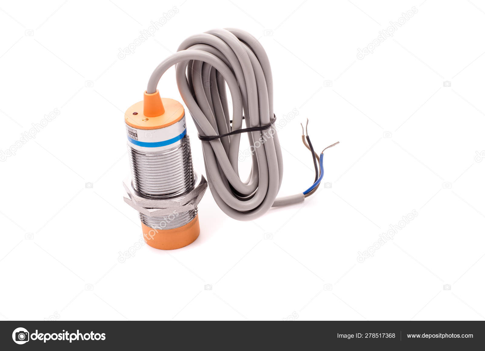 Inductive proximity sensor or proximity switch installed on the machine ...