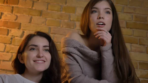 Cozy Two Girls Watching Tv