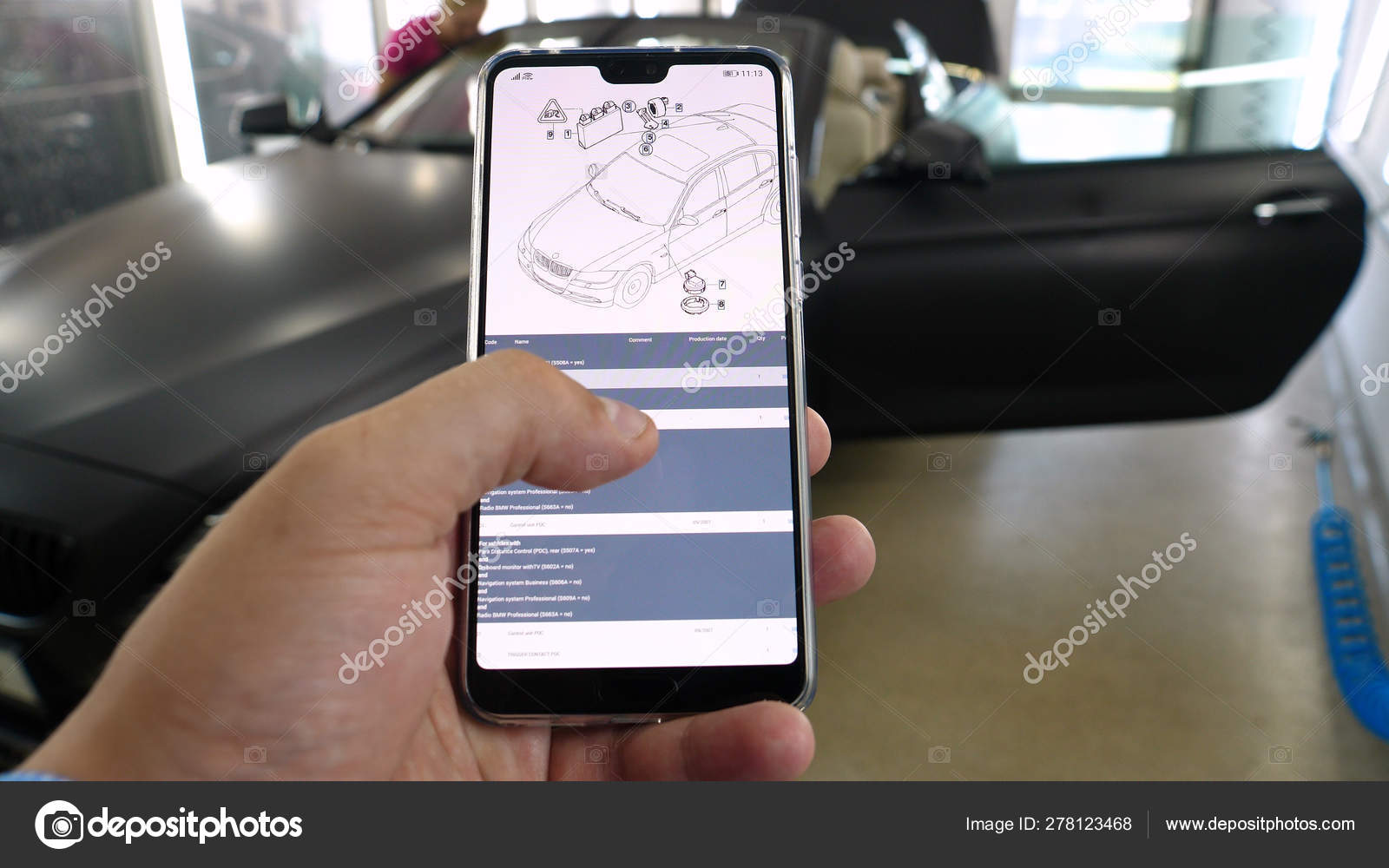 Background Car Garage Man Orders Parts Mobile Device Selecting ...