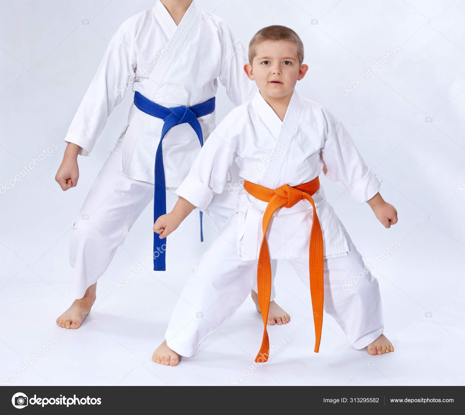 Two Athletes Karategi Stand Rack Karate White Background Stock Photo by ...