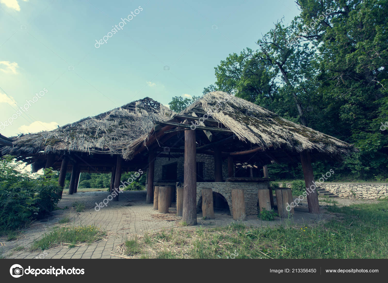 Old houses covered with reed Stock Photo by ©igorartmd 213356450