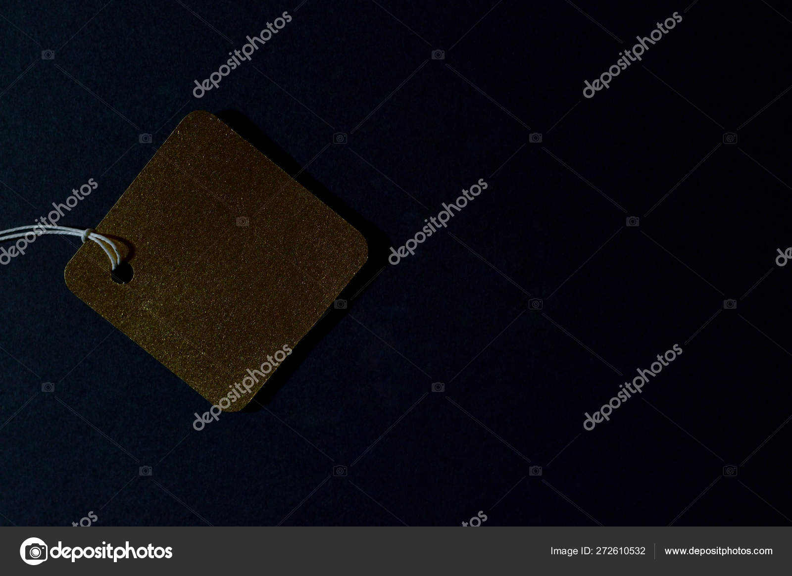 Gold diamond paper tag on dark background Stock Photo by ©padrinan ...