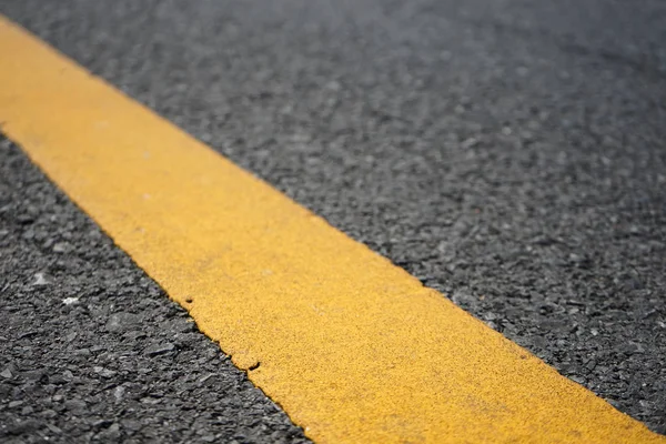 Road traffic paint Yellow on the asphalt surface - Stock Image - Everypixel